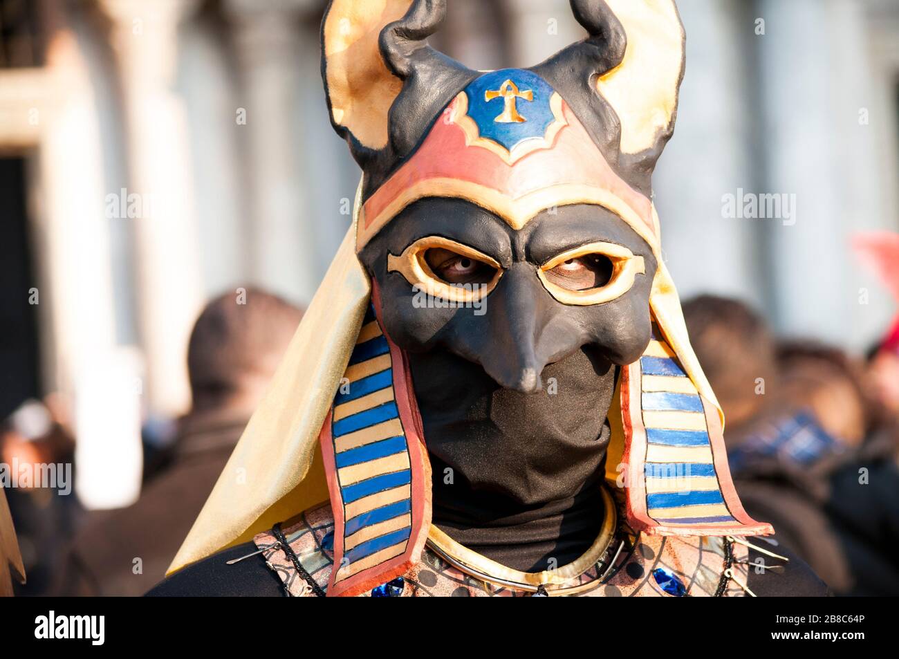 Venice Carnival characters in a colorful brown and gold Carnival ...