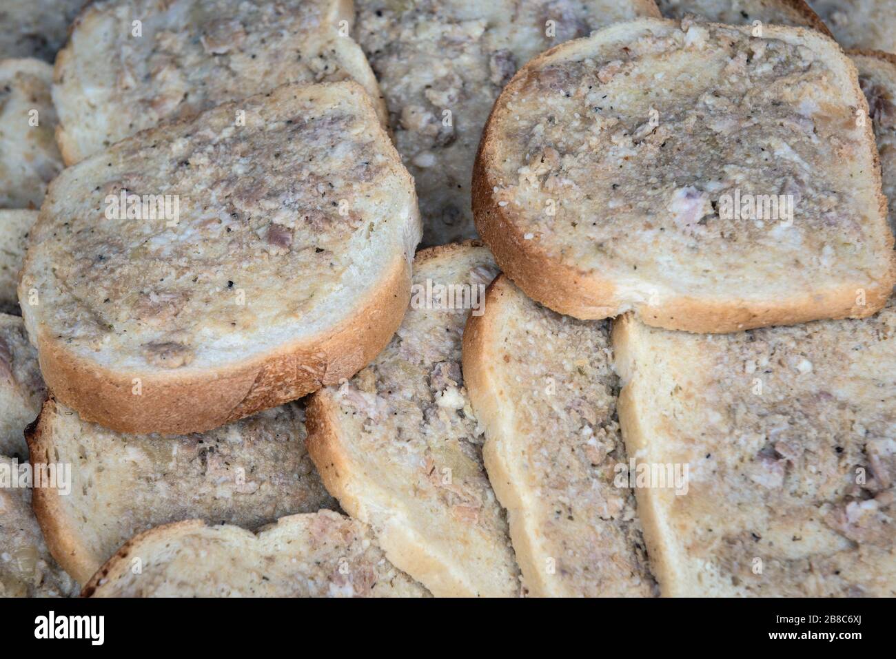 Slice of bread with lard on Dozynki Slavic harvest festival in Rogow ...