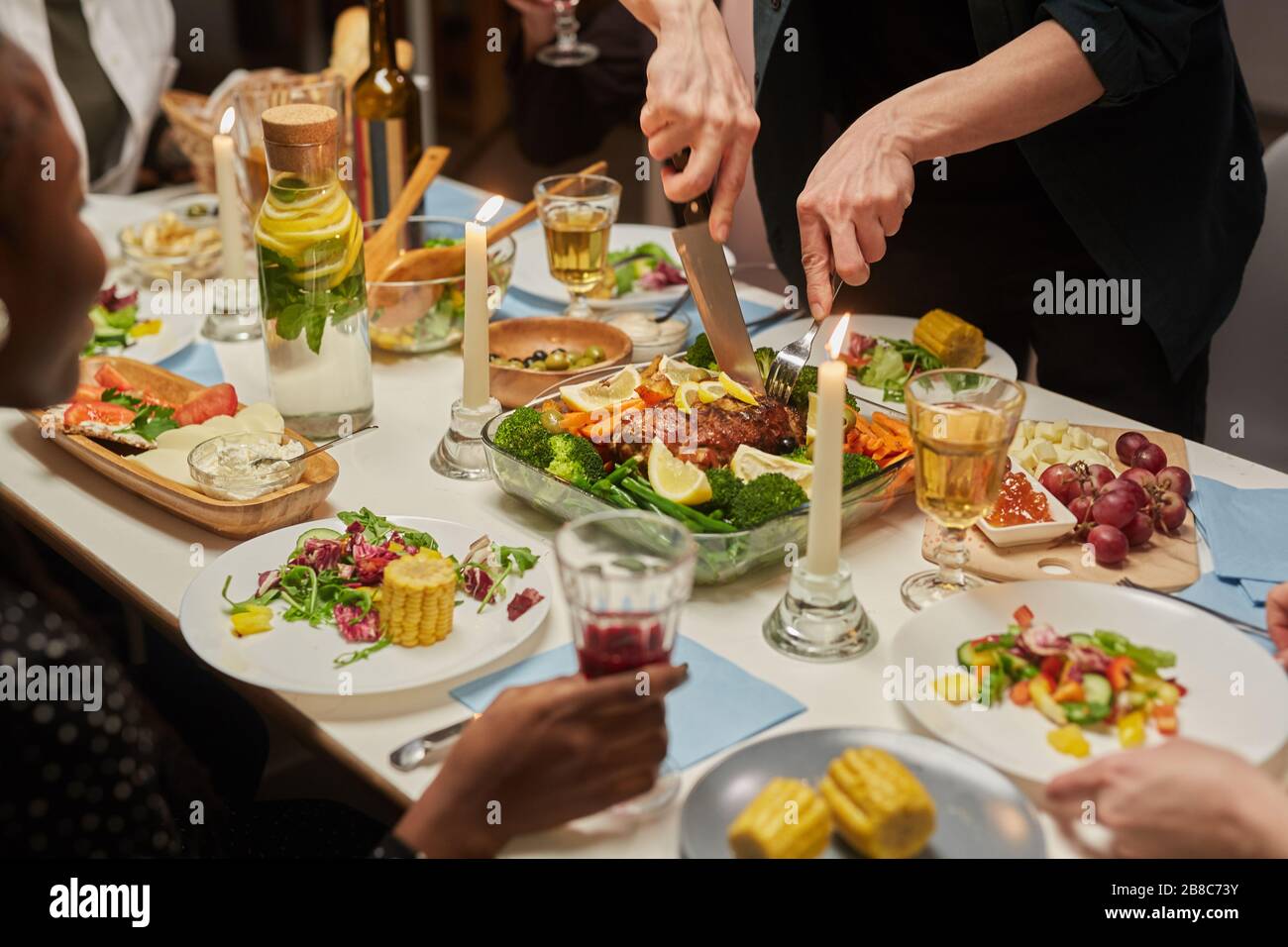 Person sitting table plate food hi-res stock photography and images - Alamy