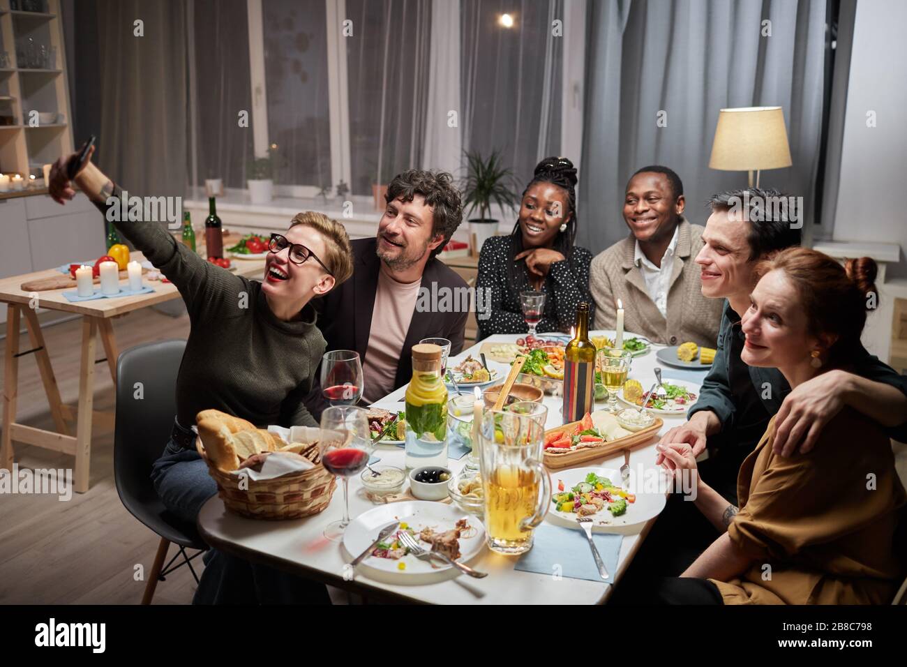 Phone dinner table party hi-res stock photography and images - Alamy