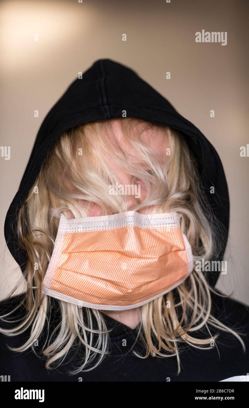 Boy face covered hair hi-res stock photography and images - Alamy