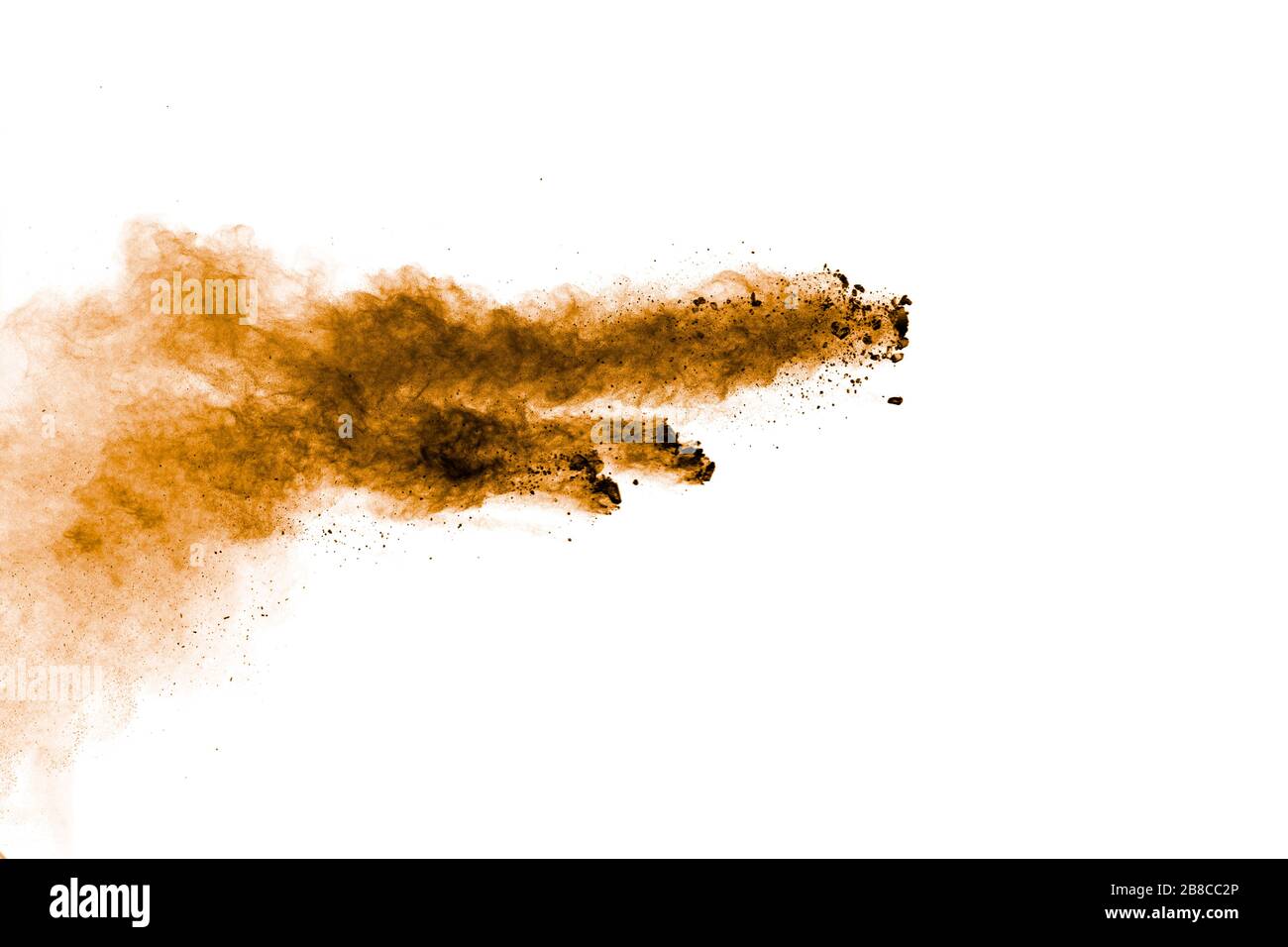 Brown dust explosion cloud.Brown particles splatter on white background ...