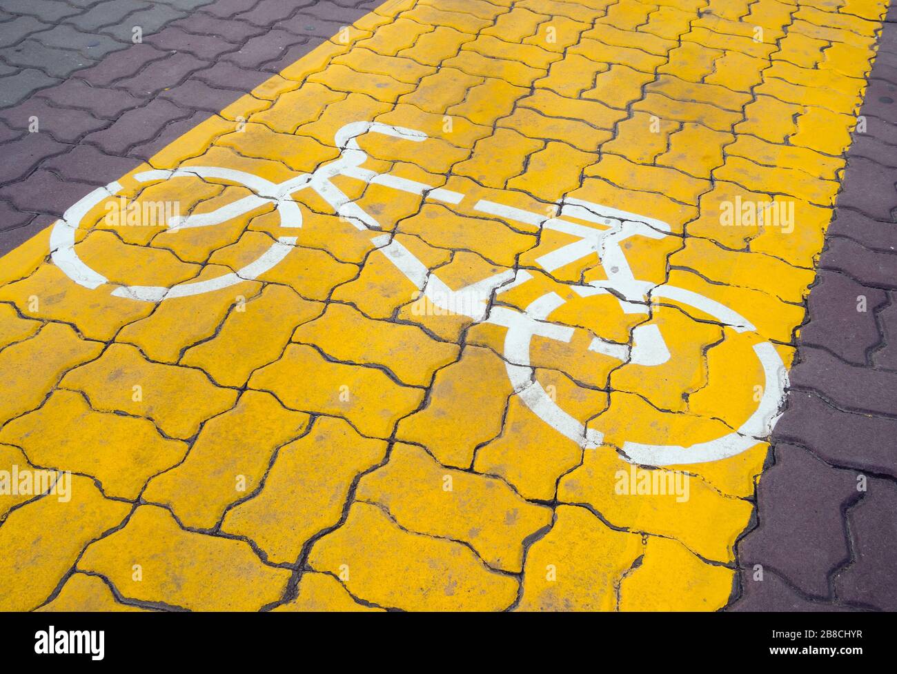 Dedicated path for cycling on the cobblestones of the pedestrian zone ...