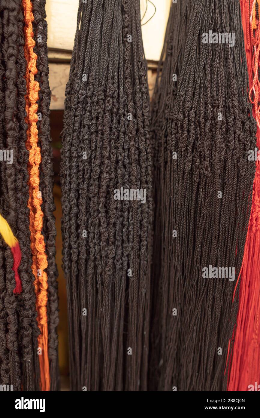 Black Color threads of Gods in tirumala Stock Photo - Alamy