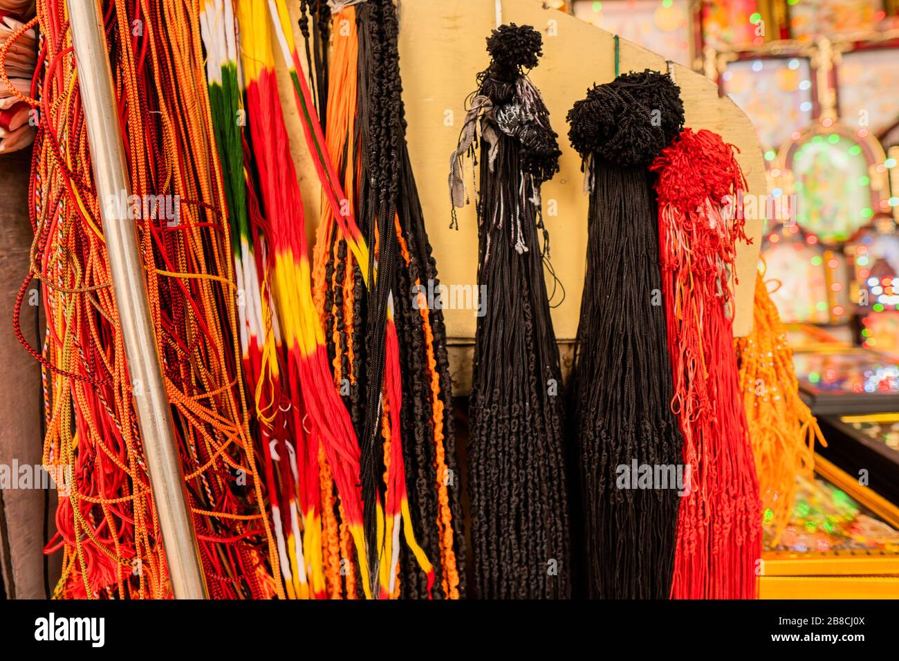 Different Color threads of Gods in tirumala Stock Photo - Alamy