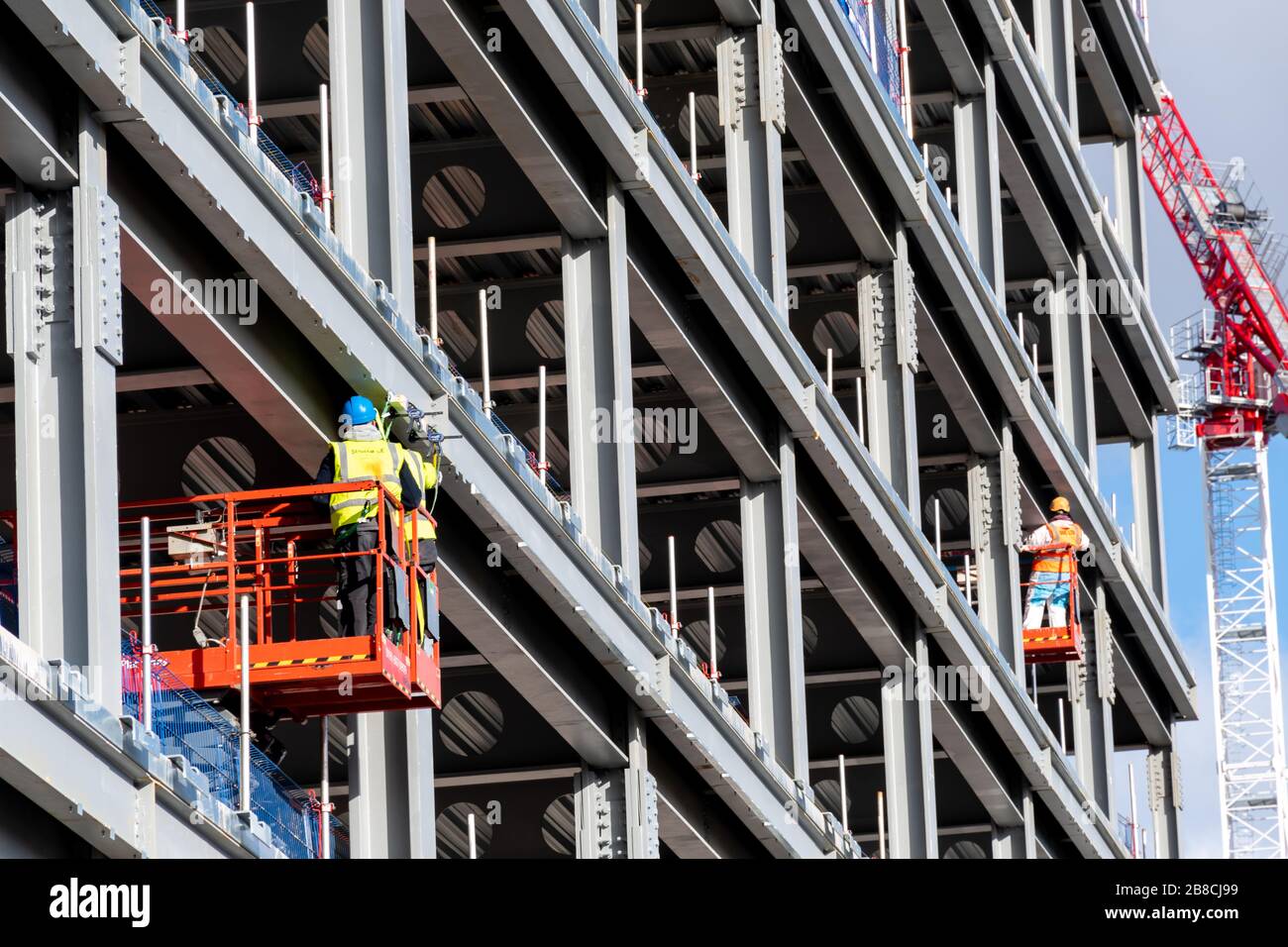 Construction workers in Glasgow continue to work through the outbreak ...