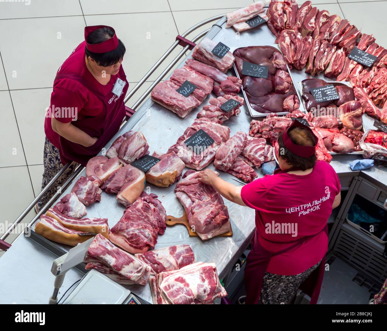 Female fresh meat seller hi-res stock photography and images - Alamy