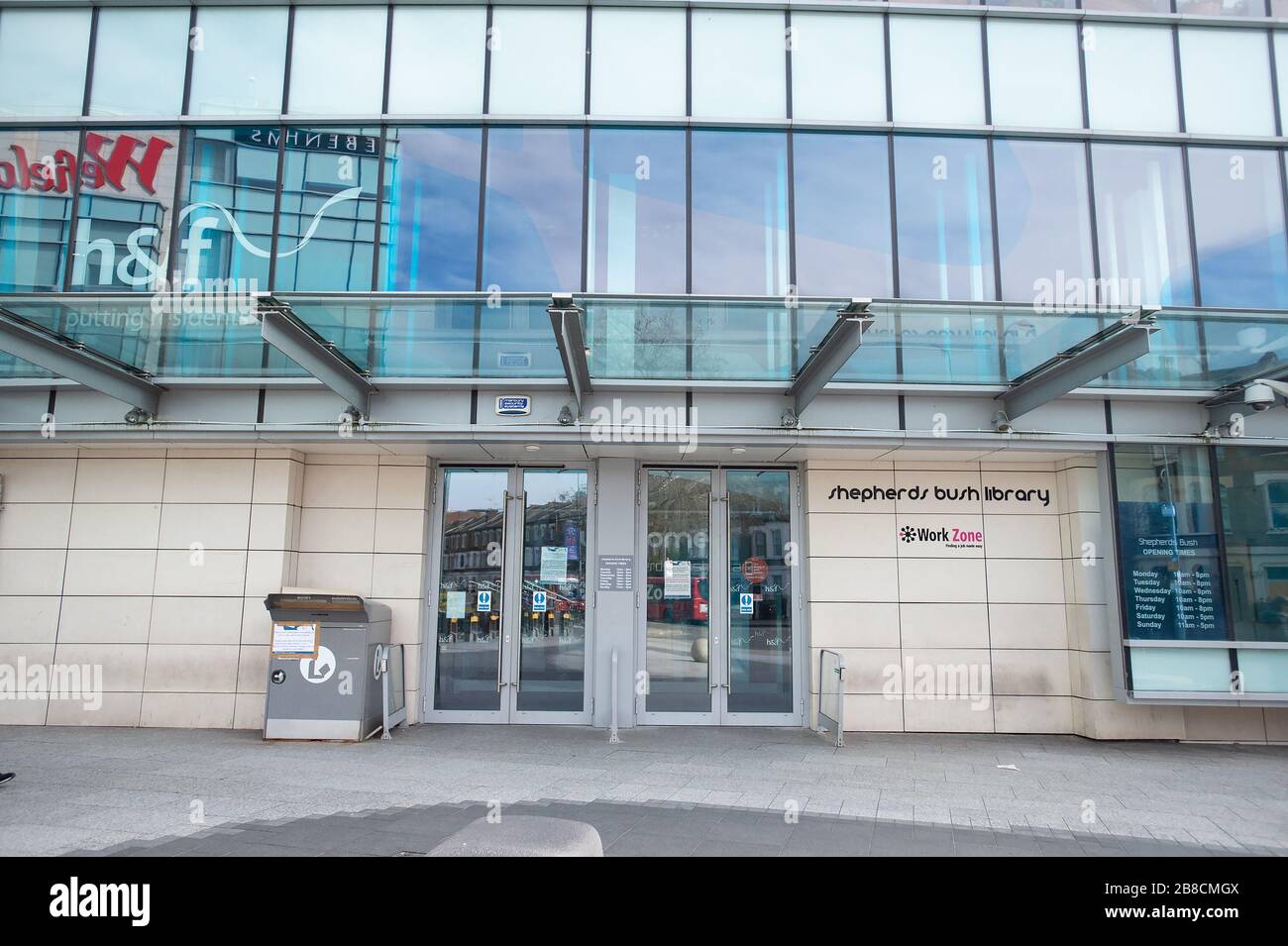 London, UK. 21st Mar, 2020. Outside the ShepherdÕs Bush Library now ...