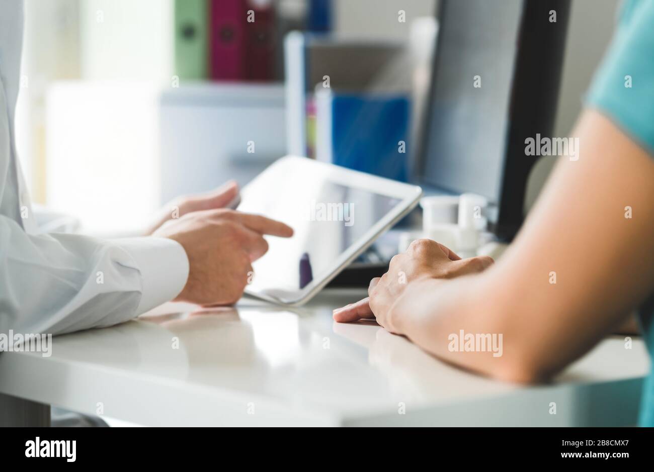Patient using computer check in hi-res stock photography and images - Alamy