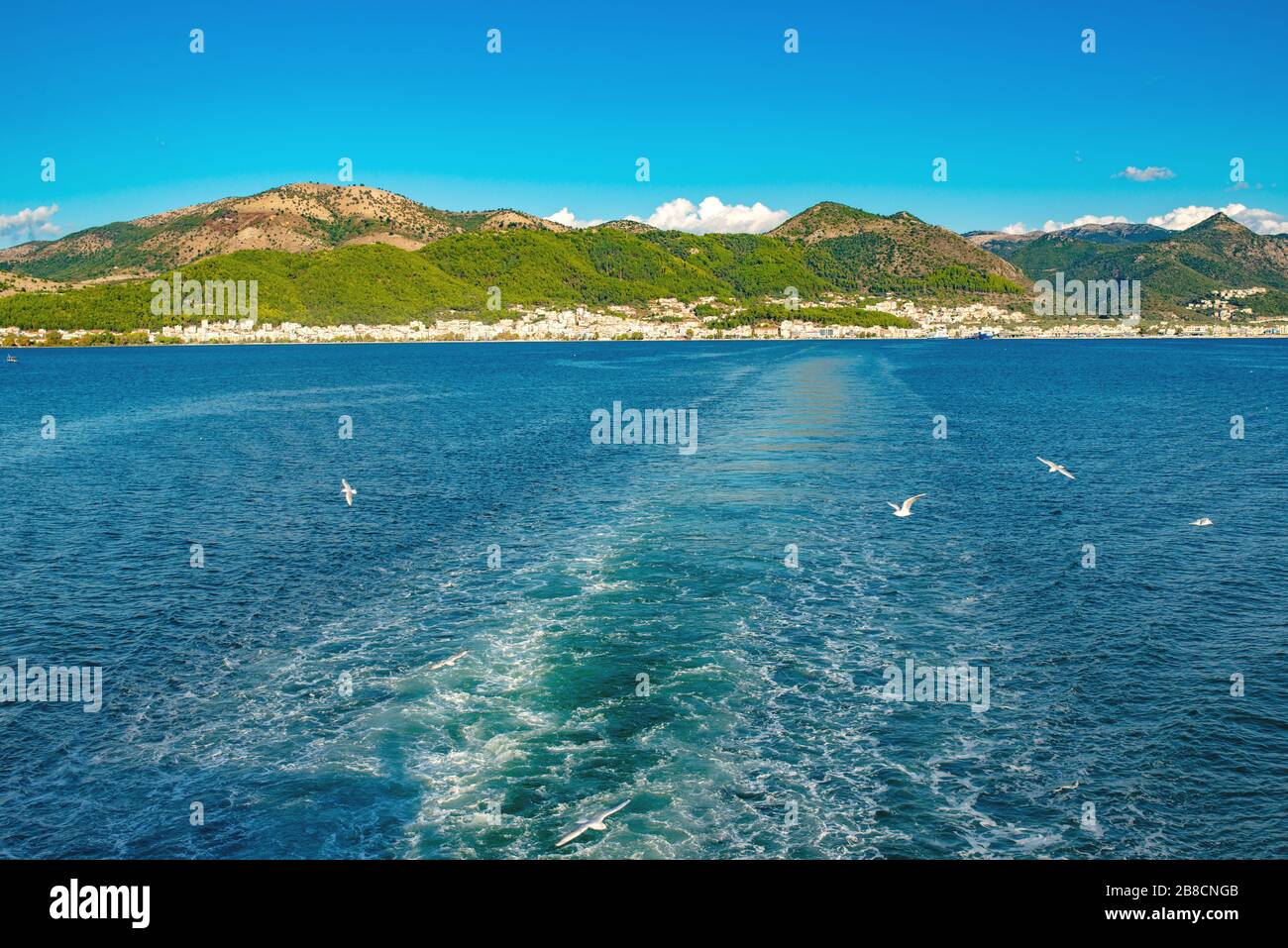 Amazing sealine with crystal clear water, trail after boat, Greece ...