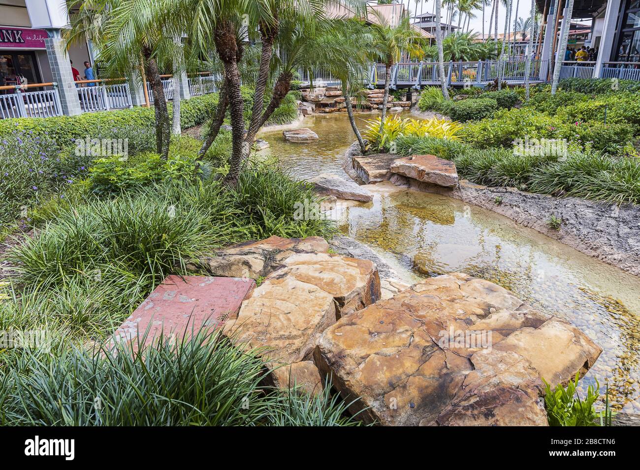 Beautiful landscape view of shopping mall center. Wonderful pond ...