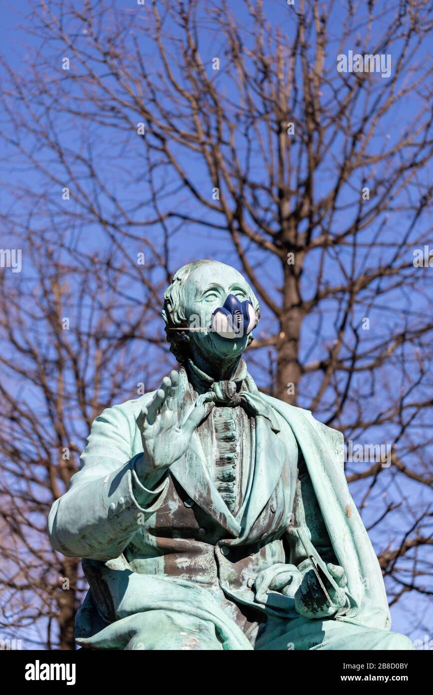 H.C. Andersen statue with face mask (a reference to COVID-19 ...