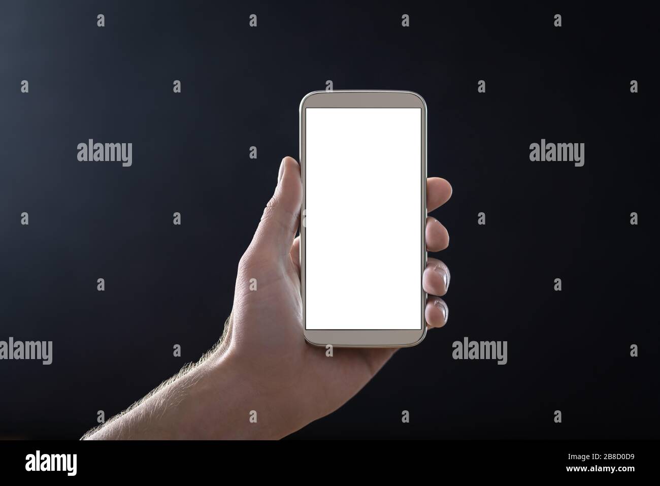 Empty mobile phone screen with dark black background in shadow at night ...