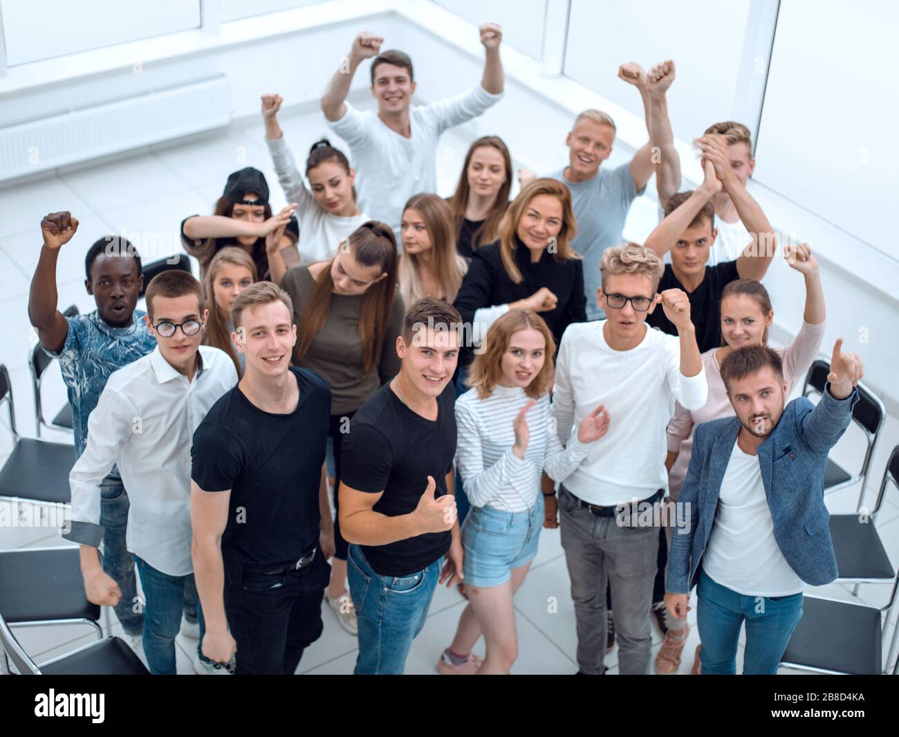 handshake of young like-minded people in a circle of friends Stock ...