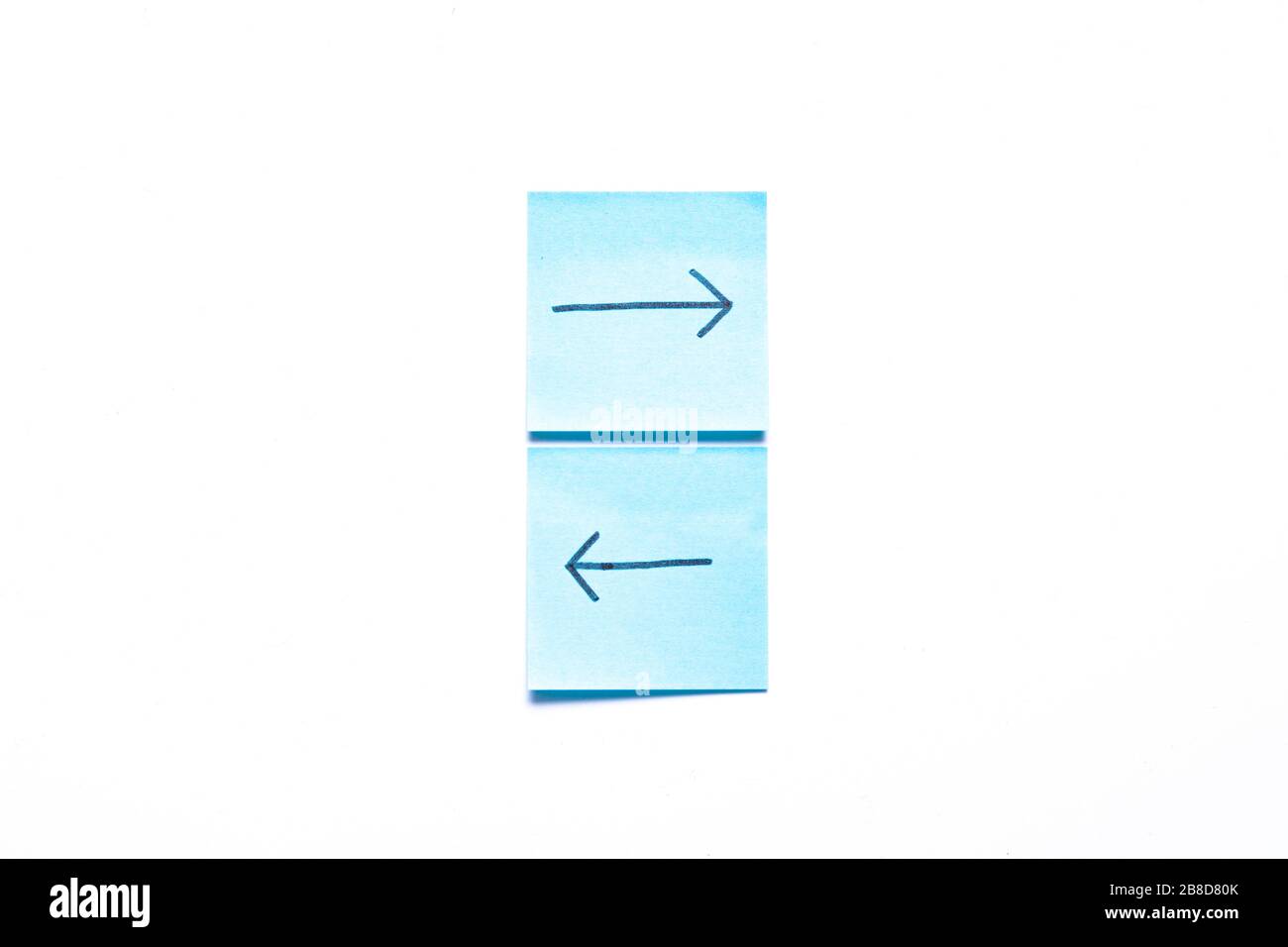 Two post its on white background with left and right arrow on it Stock ...