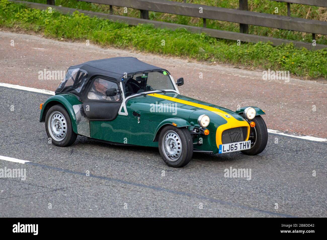 2015 Yellow green Caterham Super Seven; UK Vehicular traffic, road ...