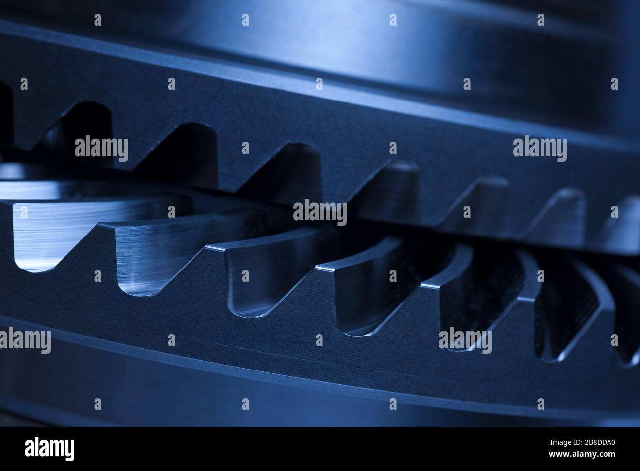 Close-up of two gear wheels in a machine Stock Photo - Alamy