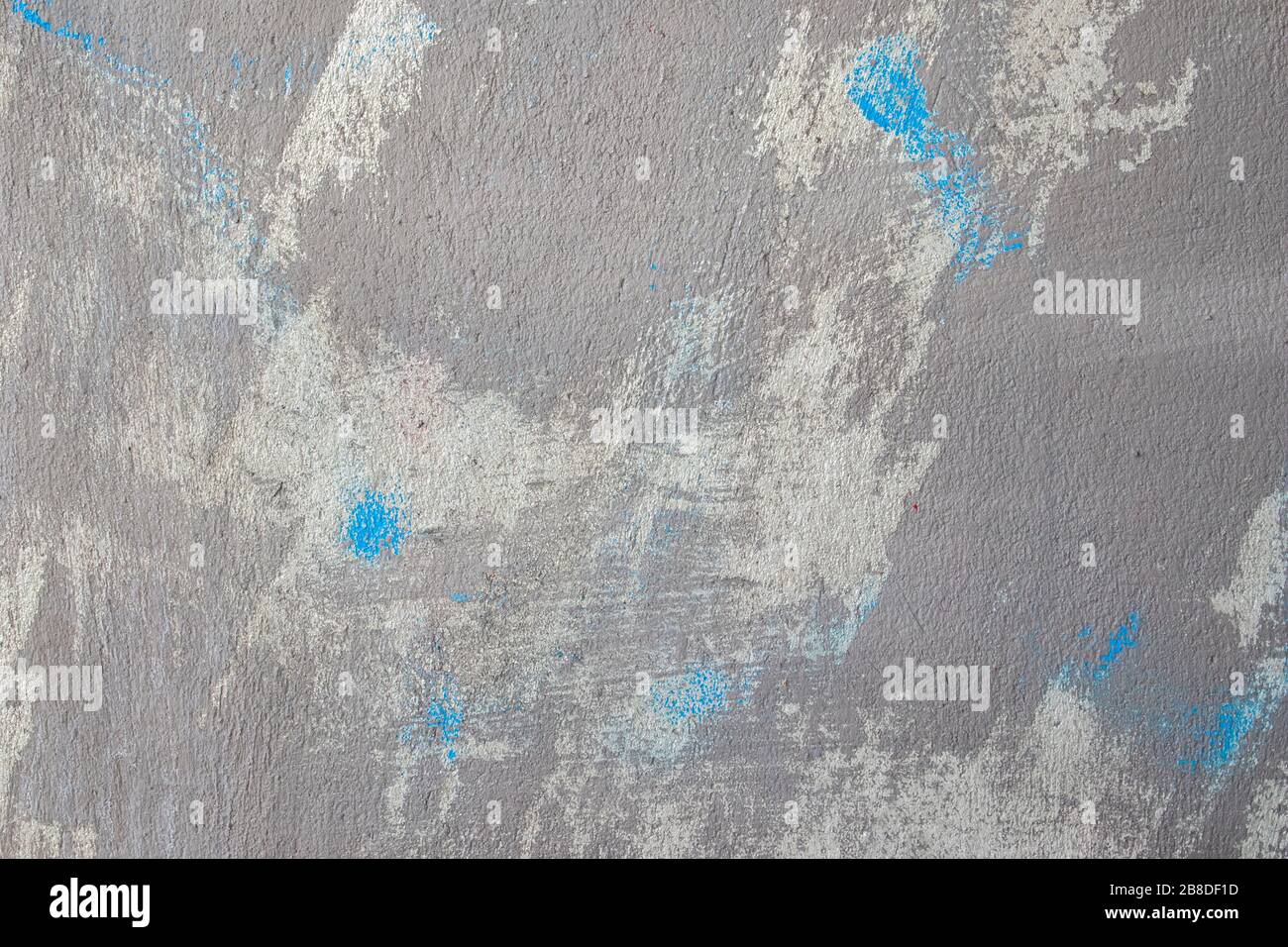 Blue paint on a concrete wall Stock Photo - Alamy