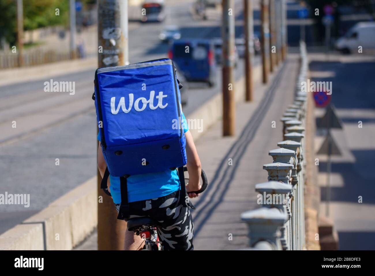 RIGA, LATVIA. 17th August 2019. Wolt company food delivery worker rides ...
