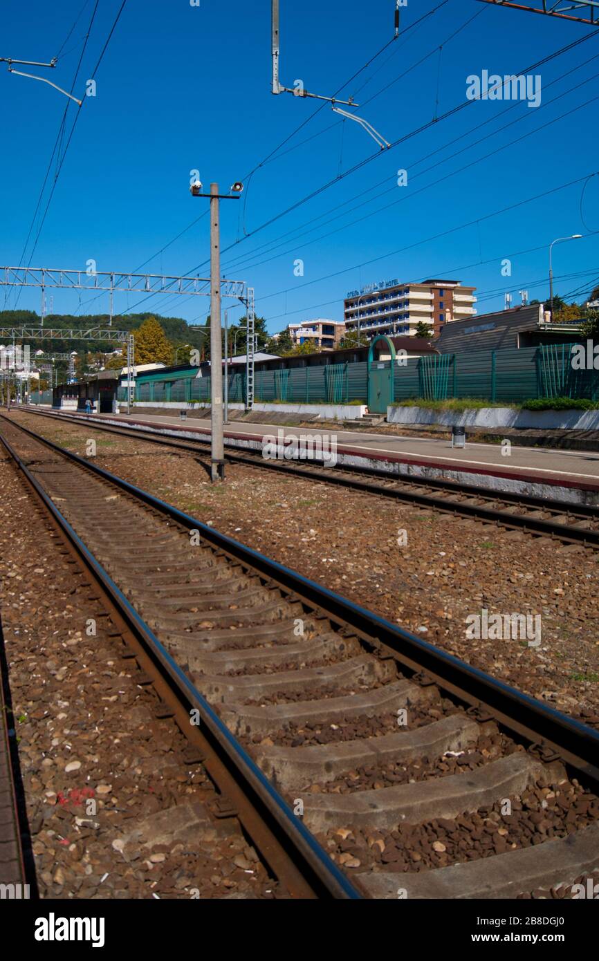 Rails, sleepers, railway close-up - vertical photo. Railroads Stock Photo - Alamy