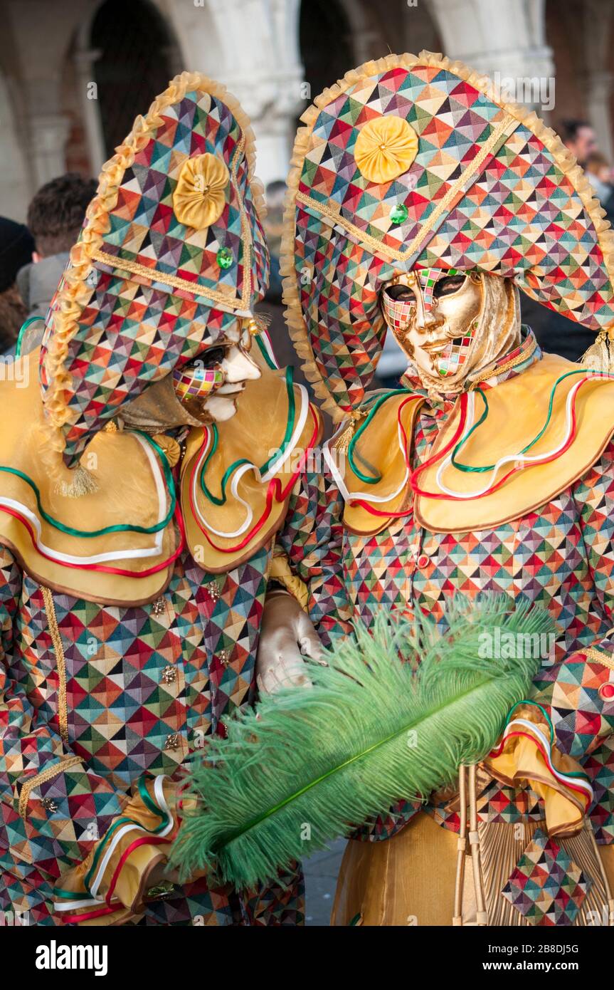 Colorful carnival masks at a traditional festival in Venice, Italy ...