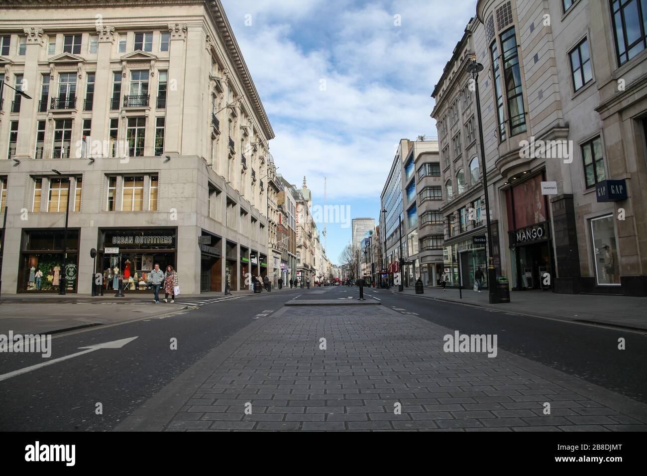 London, UK. 21st Mar, 2020. Shop closures and a quiet Oxford Street ...
