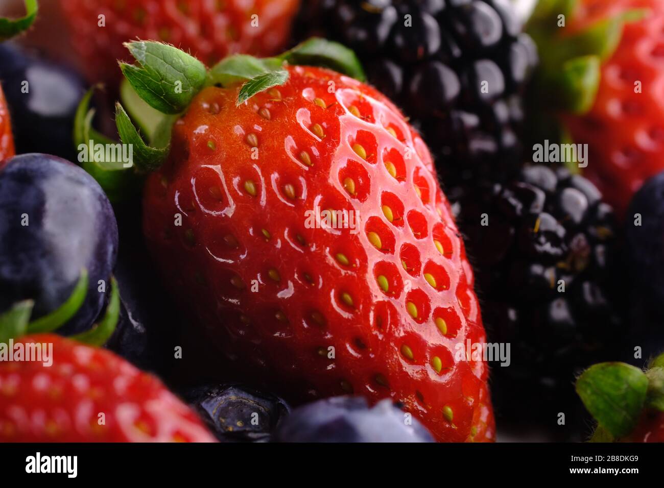 Close up of strawberry and black berry , healthy eating concept Stock ...