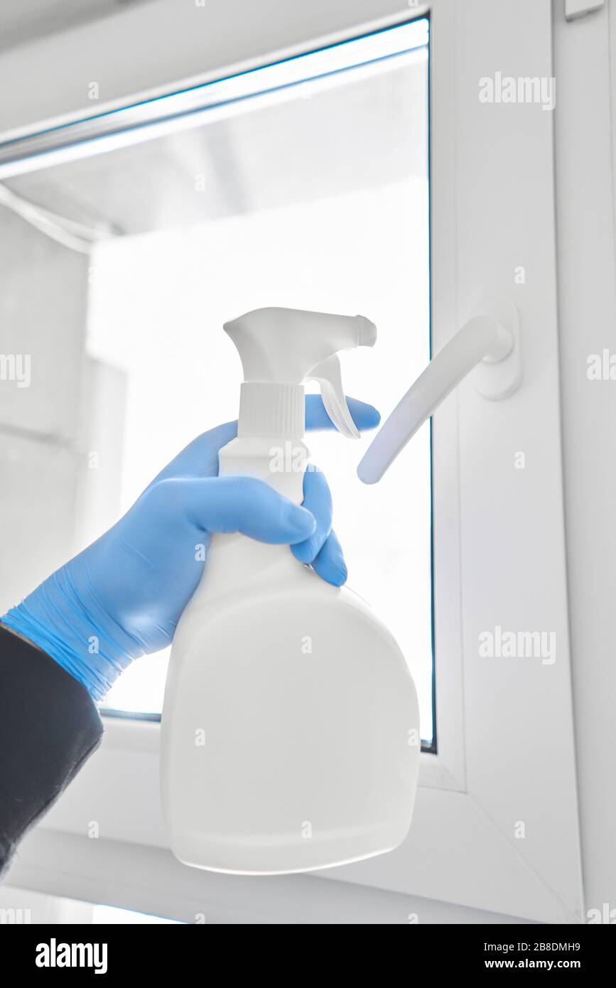 Disinfection, cleaning and washing of handle of the window. Prevention ...