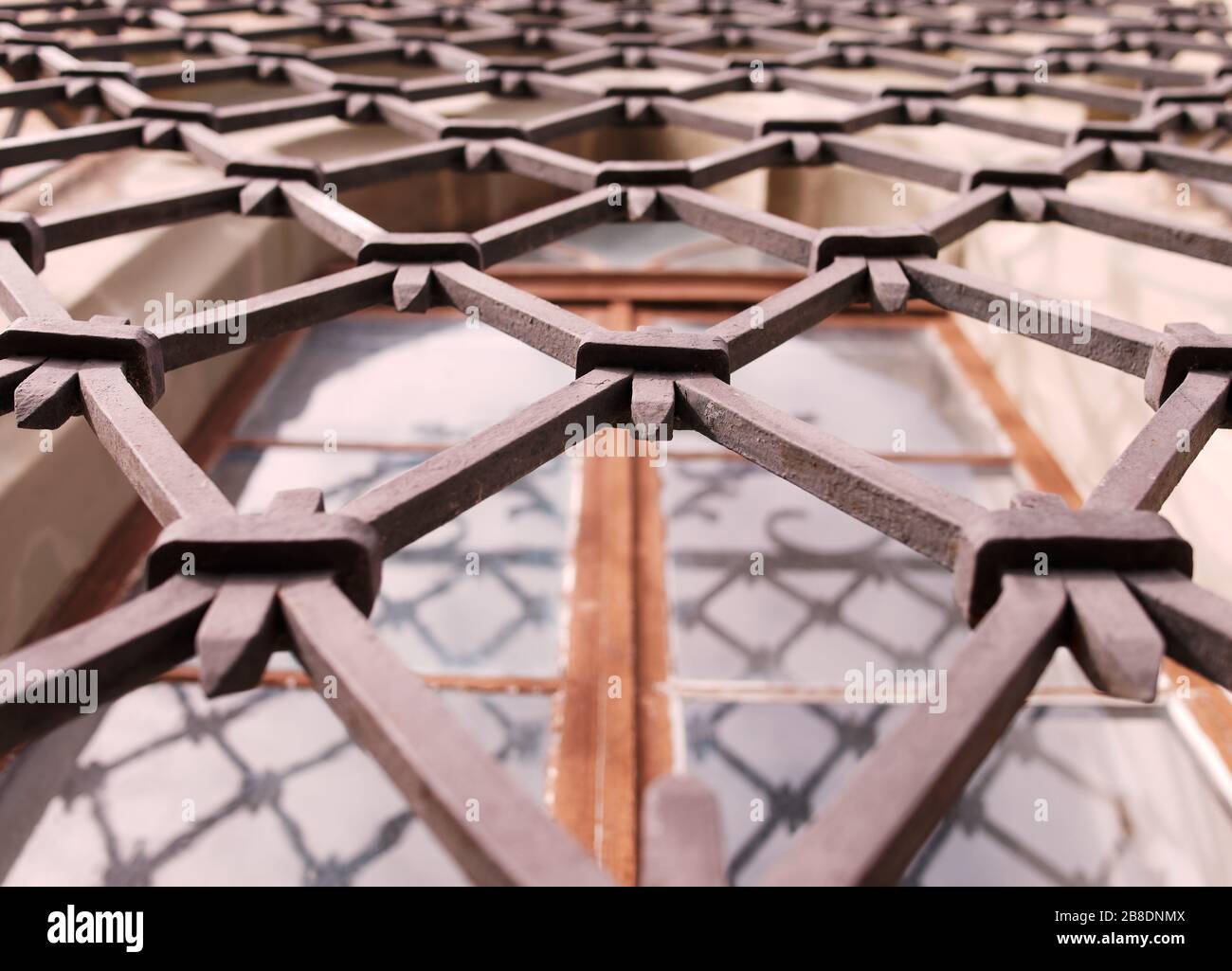 Perspective view of wrought iron forged window fence and glass window ...