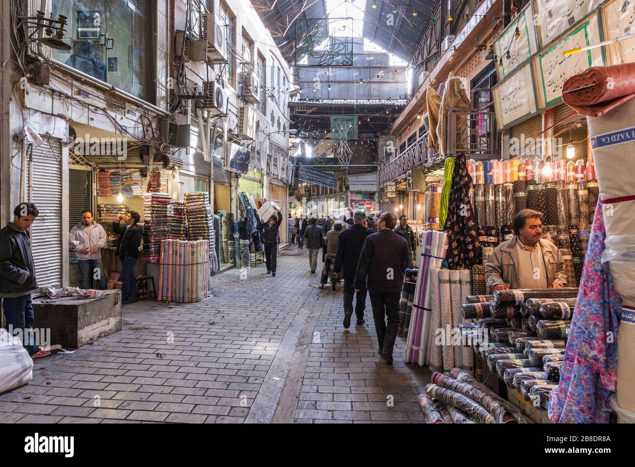 textile shops in an alley in Bazaar, Tehran, Iran Stock Photo - Alamy