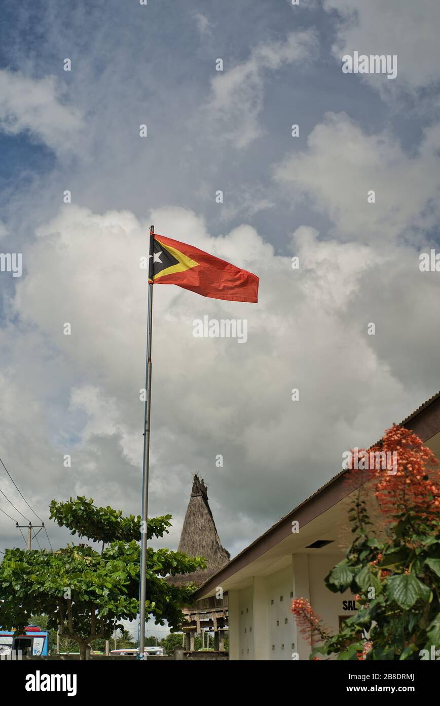 Timor Leste ( East Timor ) flag waving on the mastg. Youngest country ...