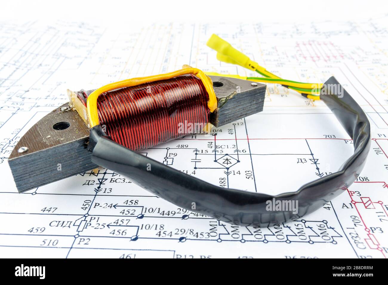 Generator coil lies on a paper circuit Stock Photo - Alamy