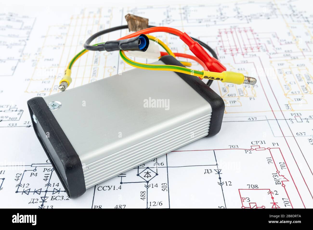 The electrical unit lies on a paper electrical circuit Stock Photo - Alamy