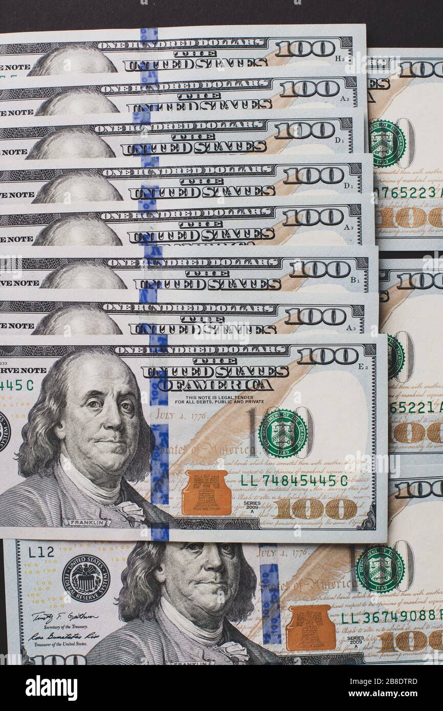 Hundred dollar bills close up, vertical orientation Stock Photo - Alamy