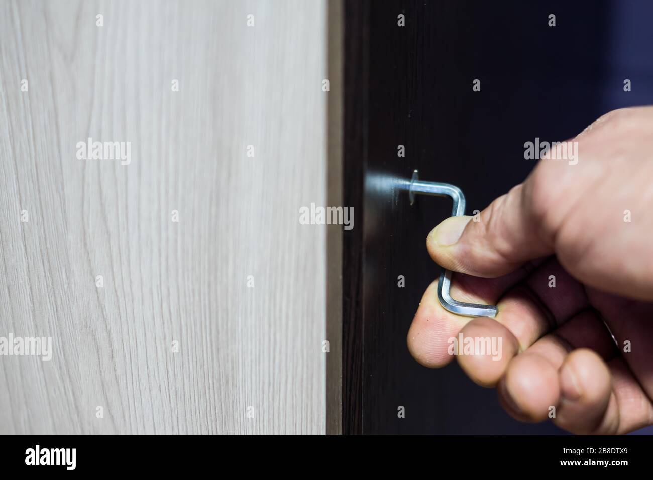 Allen wrench in hand hi-res stock photography and images - Alamy