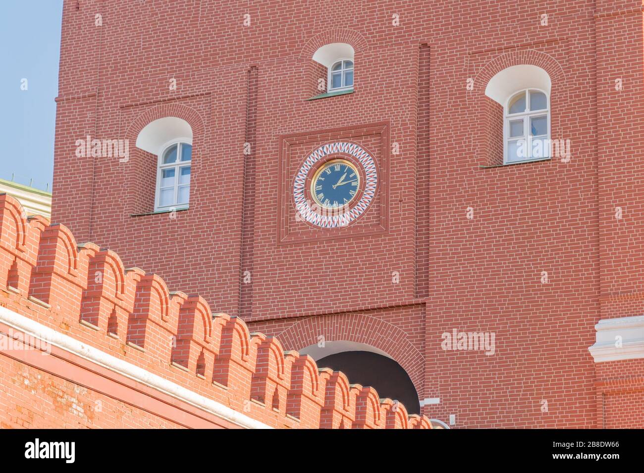 clock of the Troitskaya Tower (Trinity Tower) and fragment of kremlin ...
