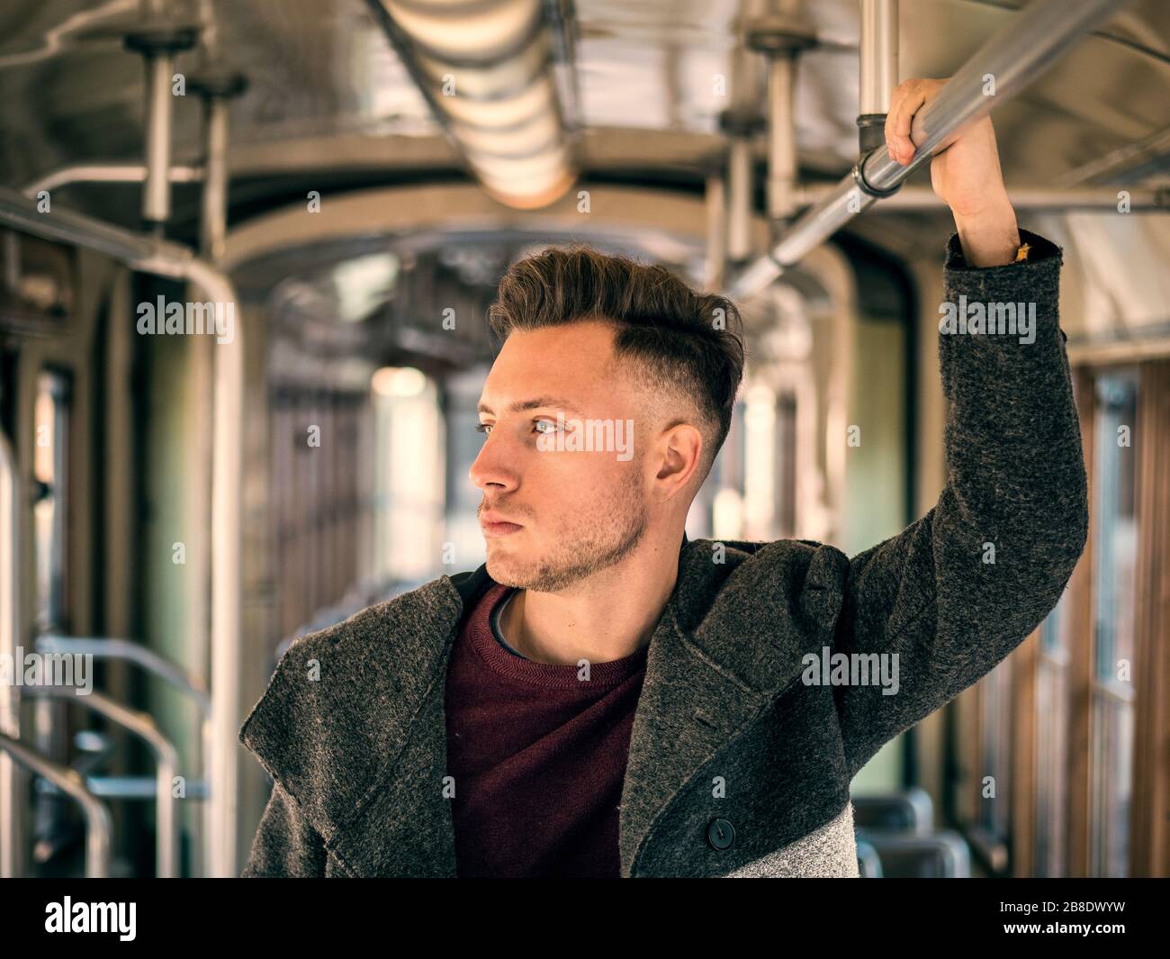 Old man standing on bus hi-res stock photography and images - Alamy