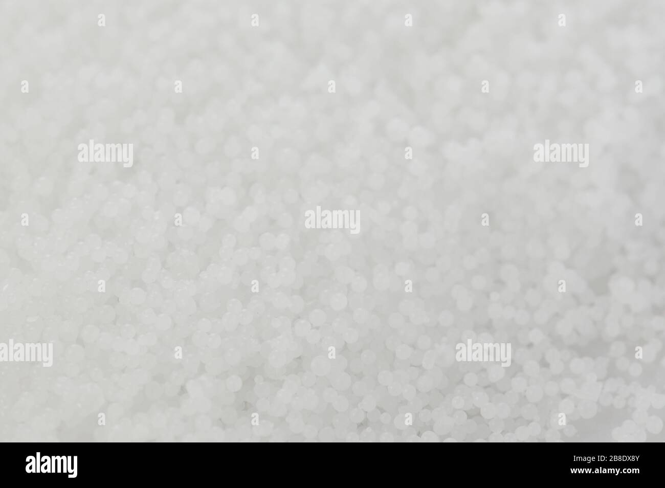 White small balls background macro close up view Stock Photo - Alamy