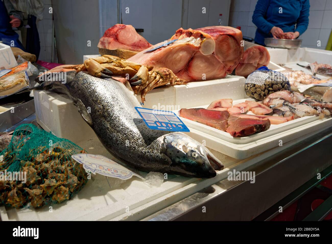 Salmon, tuna and various seafood on fish market display Stock Photo - Alamy