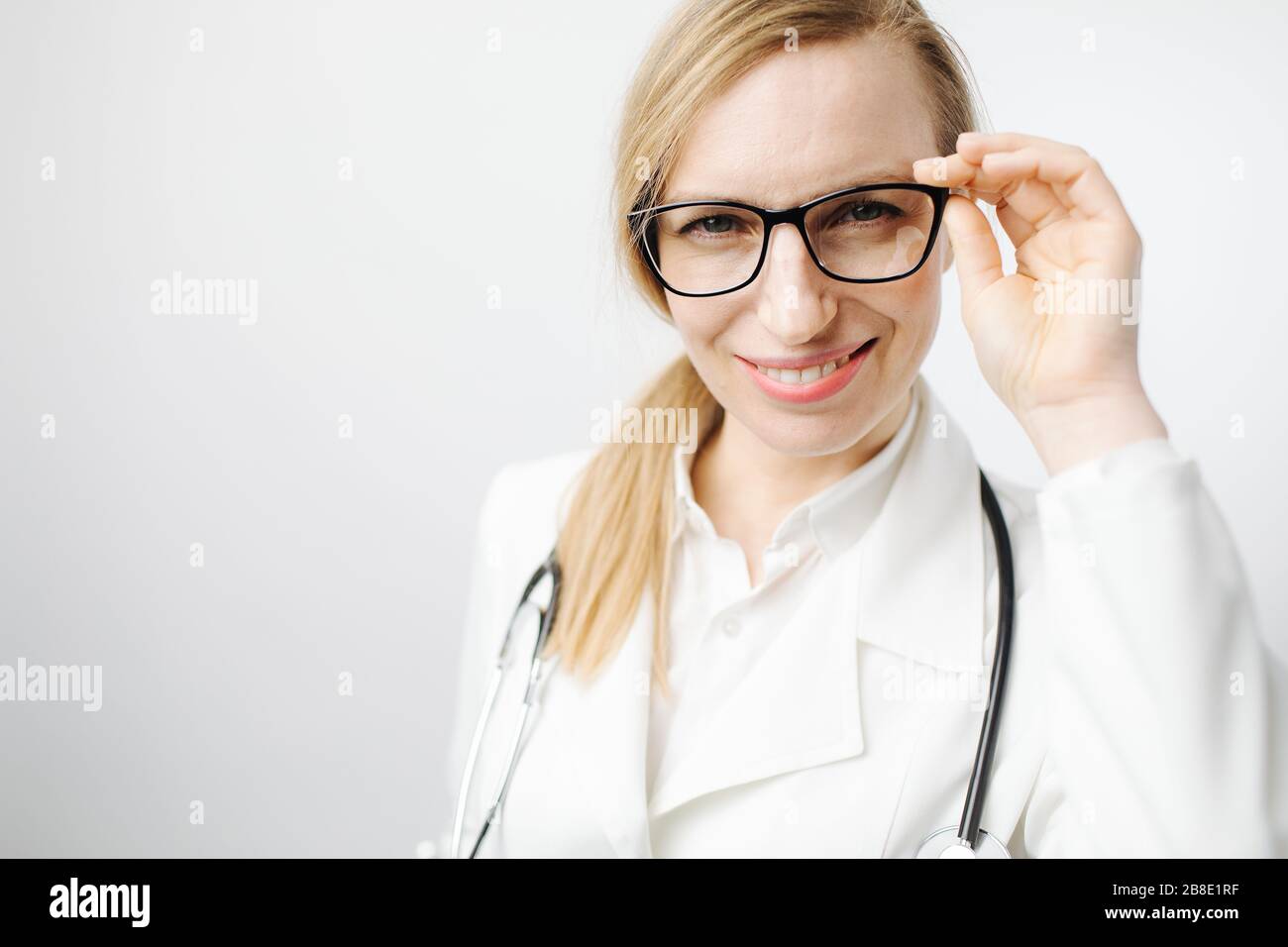 Beautiful woman doctor wearing eyeglasses hi-res stock photography and ...