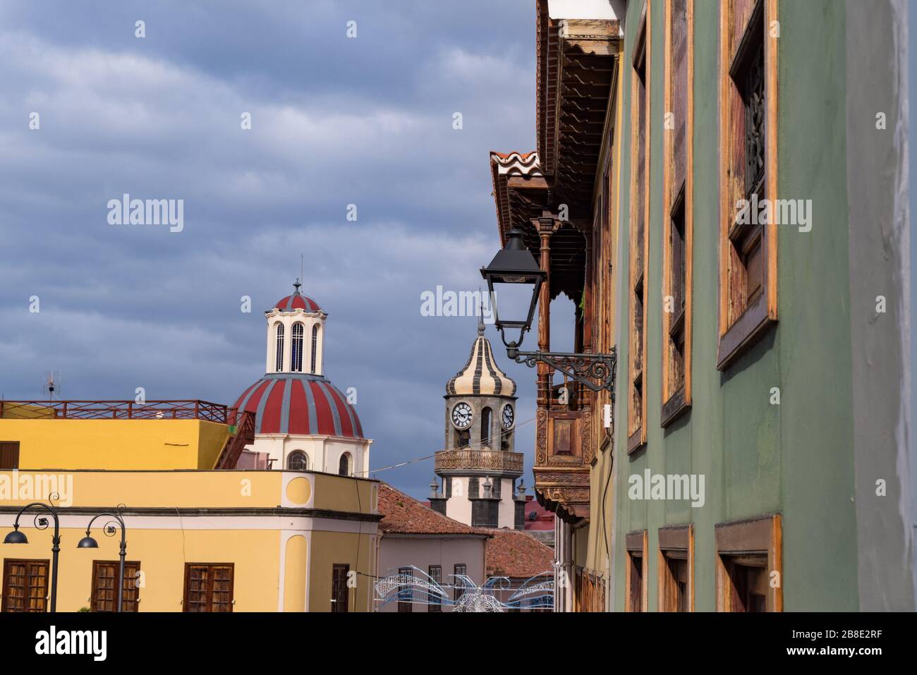 Street with typical colonial style houses on medieval street of old ...