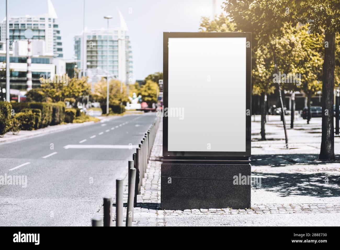 Mockup of an empty information poster in urban settings near a city ...