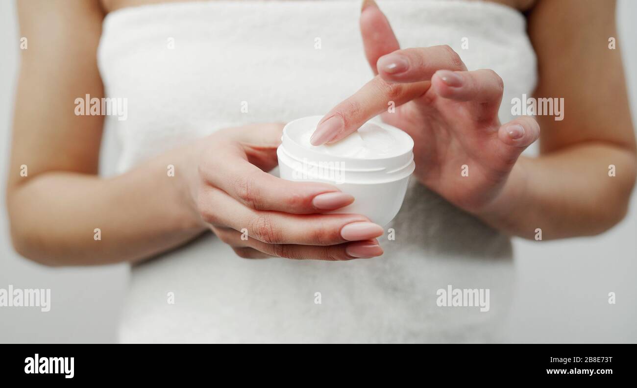 Female hands taking cream close-up Stock Photo - Alamy