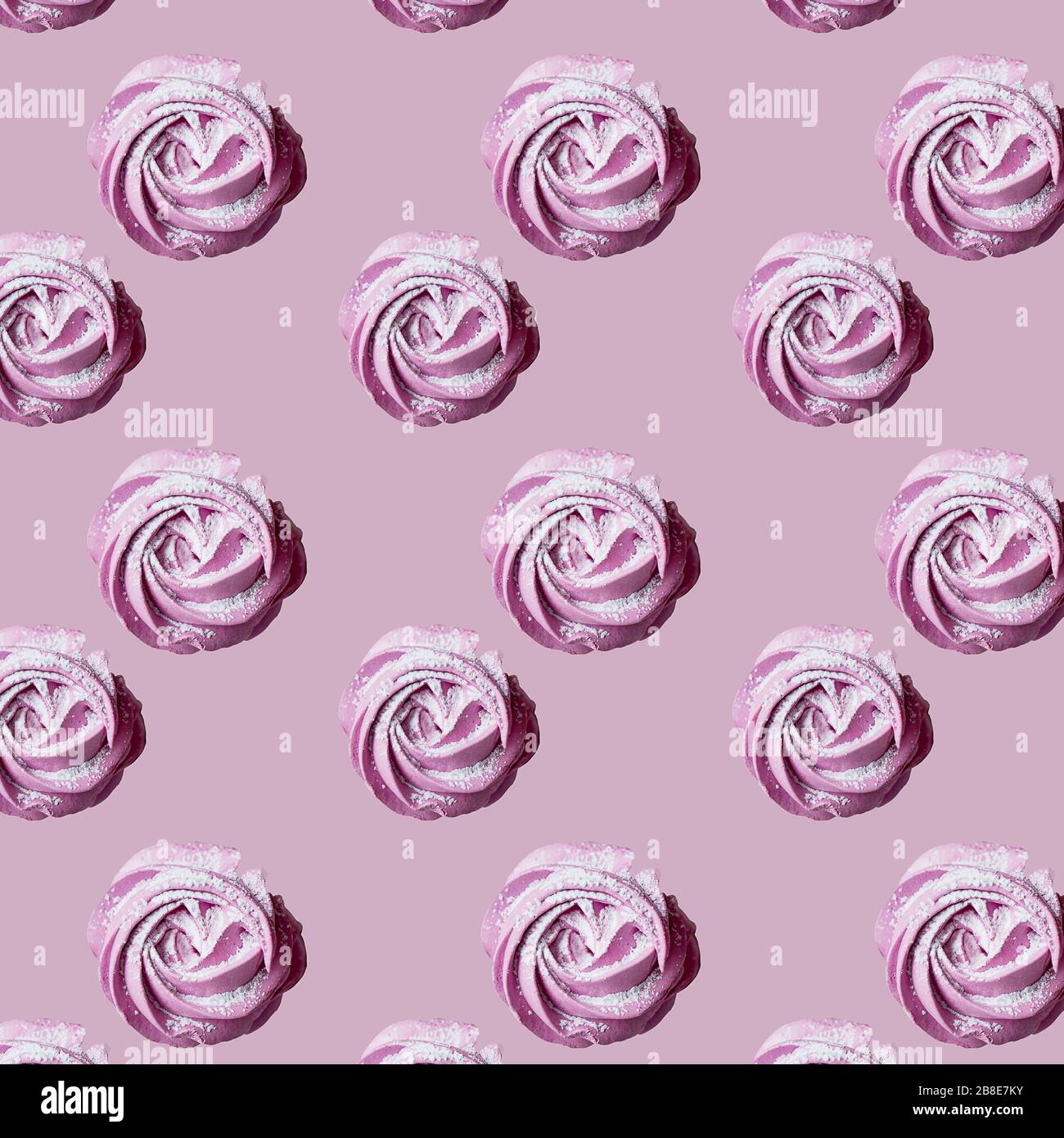 Pattern with Bizet cakes.Pink color, powdered sugar. The view from the ...