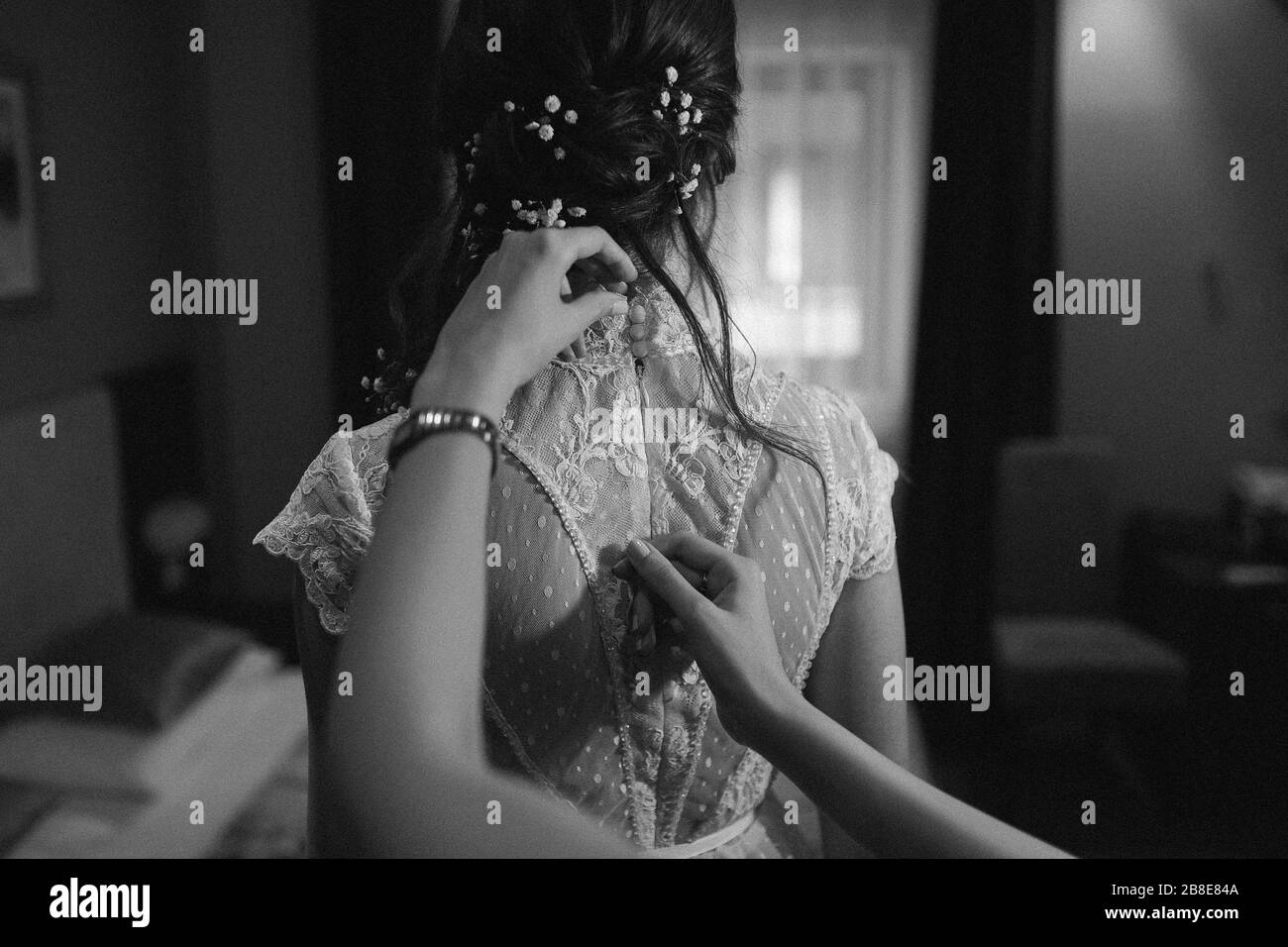 The beautiful bride is getting ready for her wedding Stock Photo - Alamy