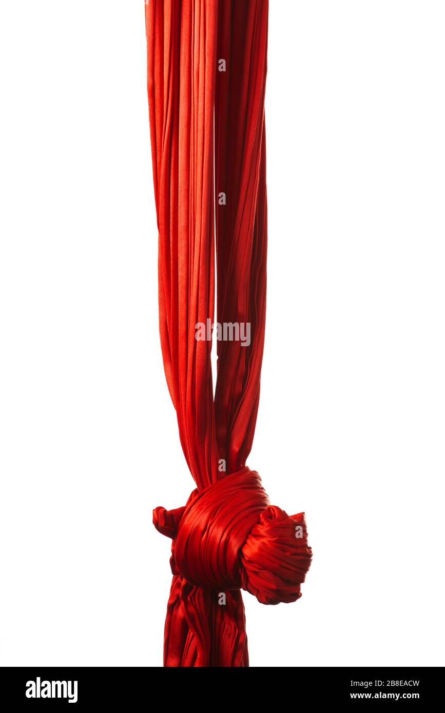 Red aerial ribbon tied in knot for aerial acrobatics and gymnastics ...