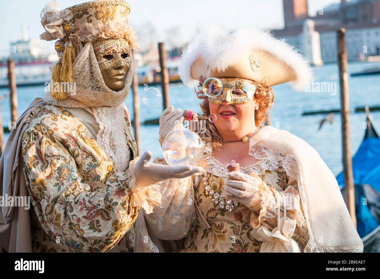 Colorful carnival masks at a traditional festival in Venice, Italy ...