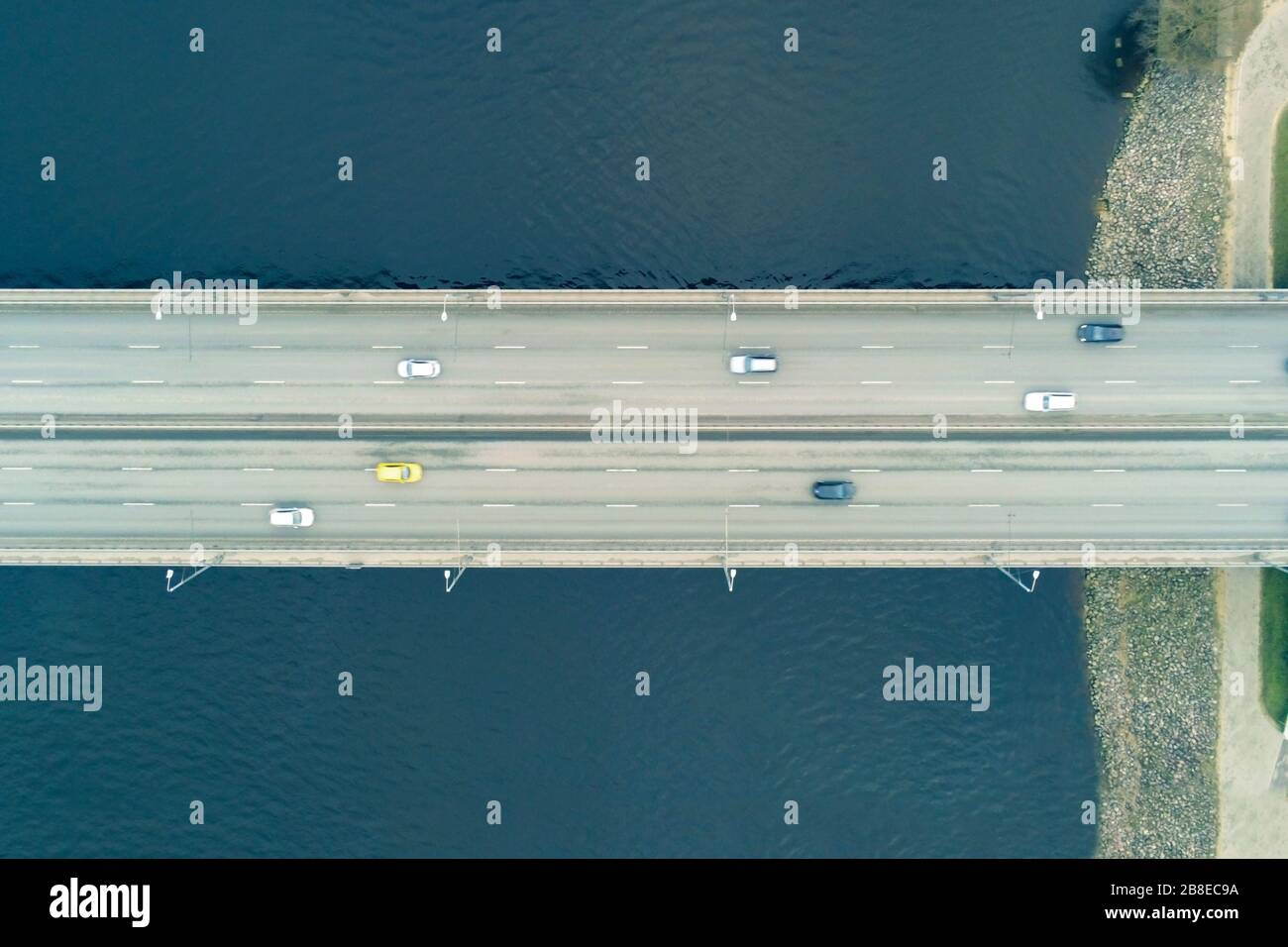 Aerial top view of water bridge with moving traffic. Drone photo. Road ...