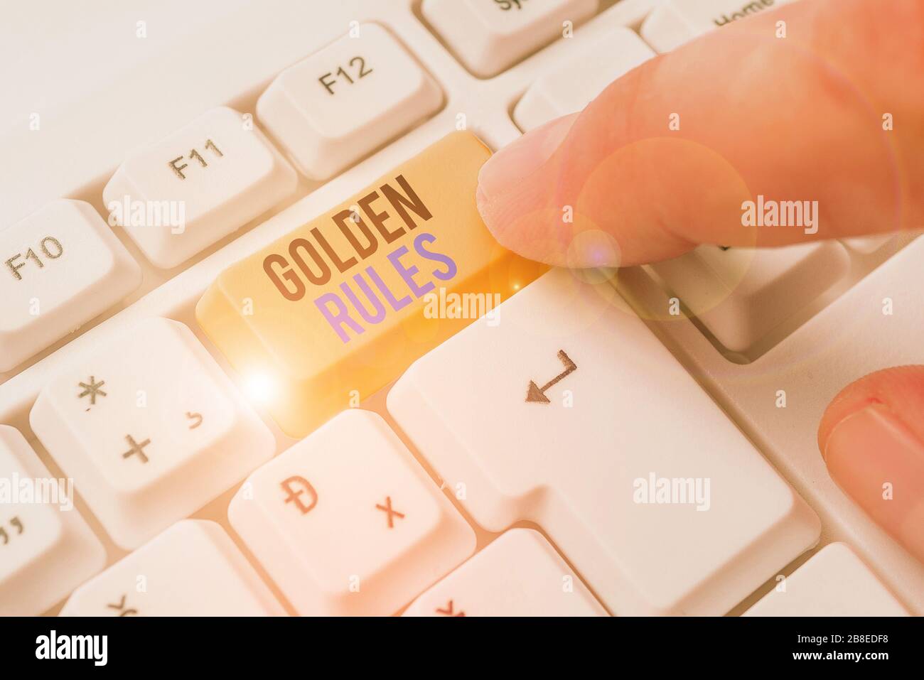 Writing note showing Golden Rules. Business concept for basic principle ...