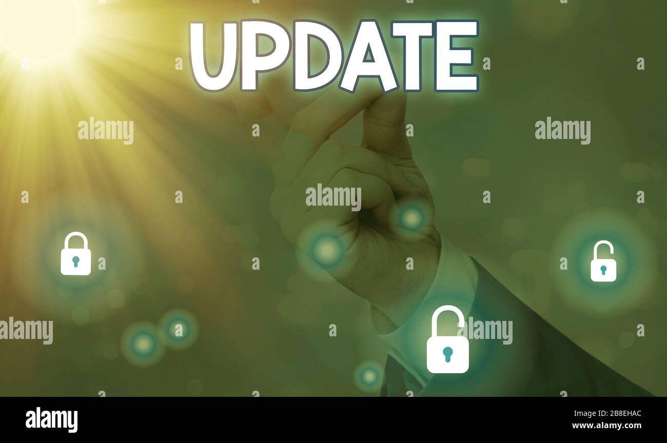 Conceptual hand writing showing Update. Concept meaning make something more modern or up to date ...